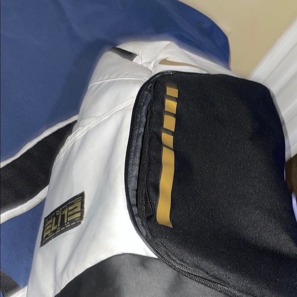 Nike | Bags | Nike Black And White Backpack With Gold Accents | Poshmark